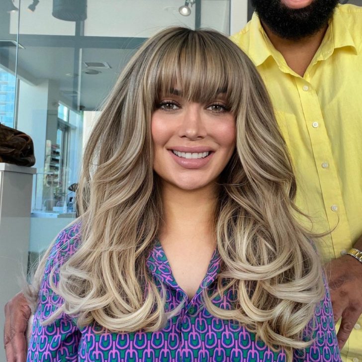 23 Fashion-Forward Ways to Rock Long Hair With Bangs