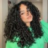 22 Flattering Ways To Pair Curtain Bangs With Curly Hair