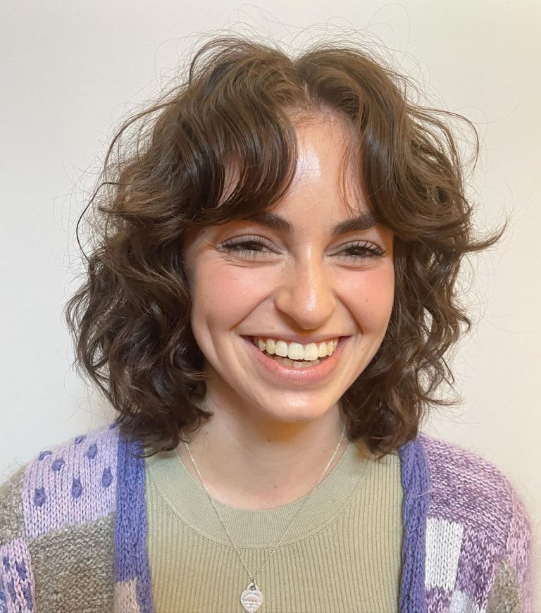 22 Flattering Ways To Pair Curtain Bangs With Curly Hair