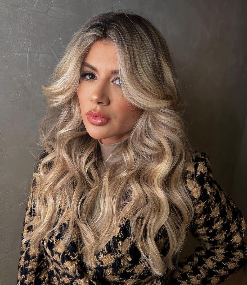 Curtain Bangs With Wavy Hair Trend Is Set To Dominate 2025