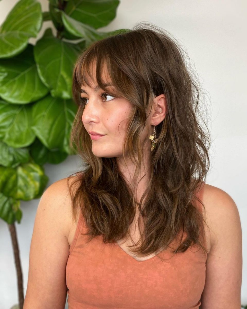 20 Unique Wavy Hair Wolf Cut Looks To Rock In 2025