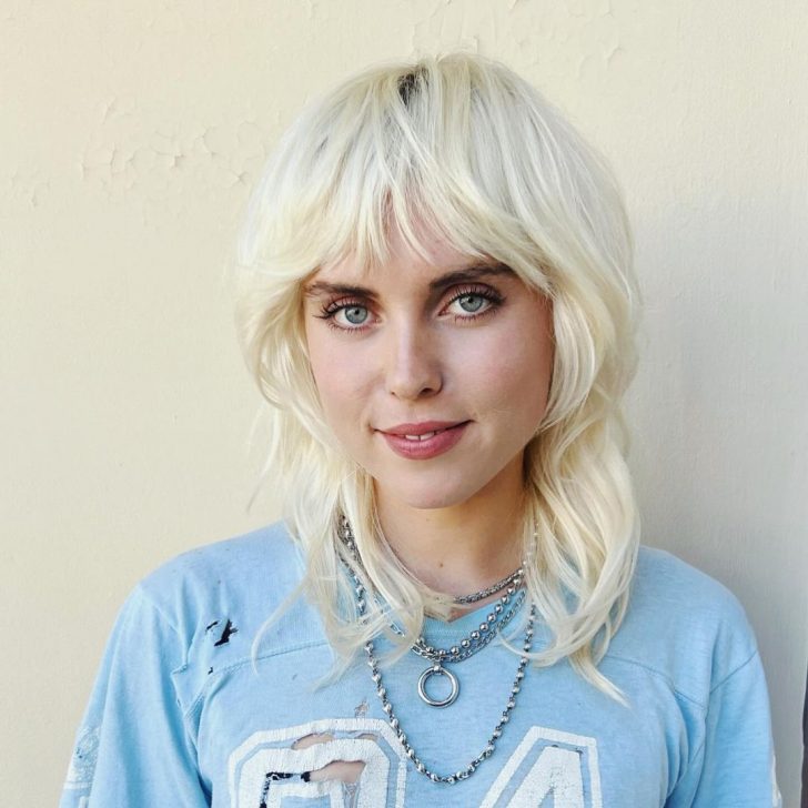 20 Unique Wavy Hair Wolf Cut Looks To Rock In 2025