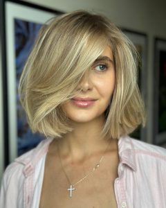 Face-Framing Layers With Side Part Are The Secret To Mega Volume