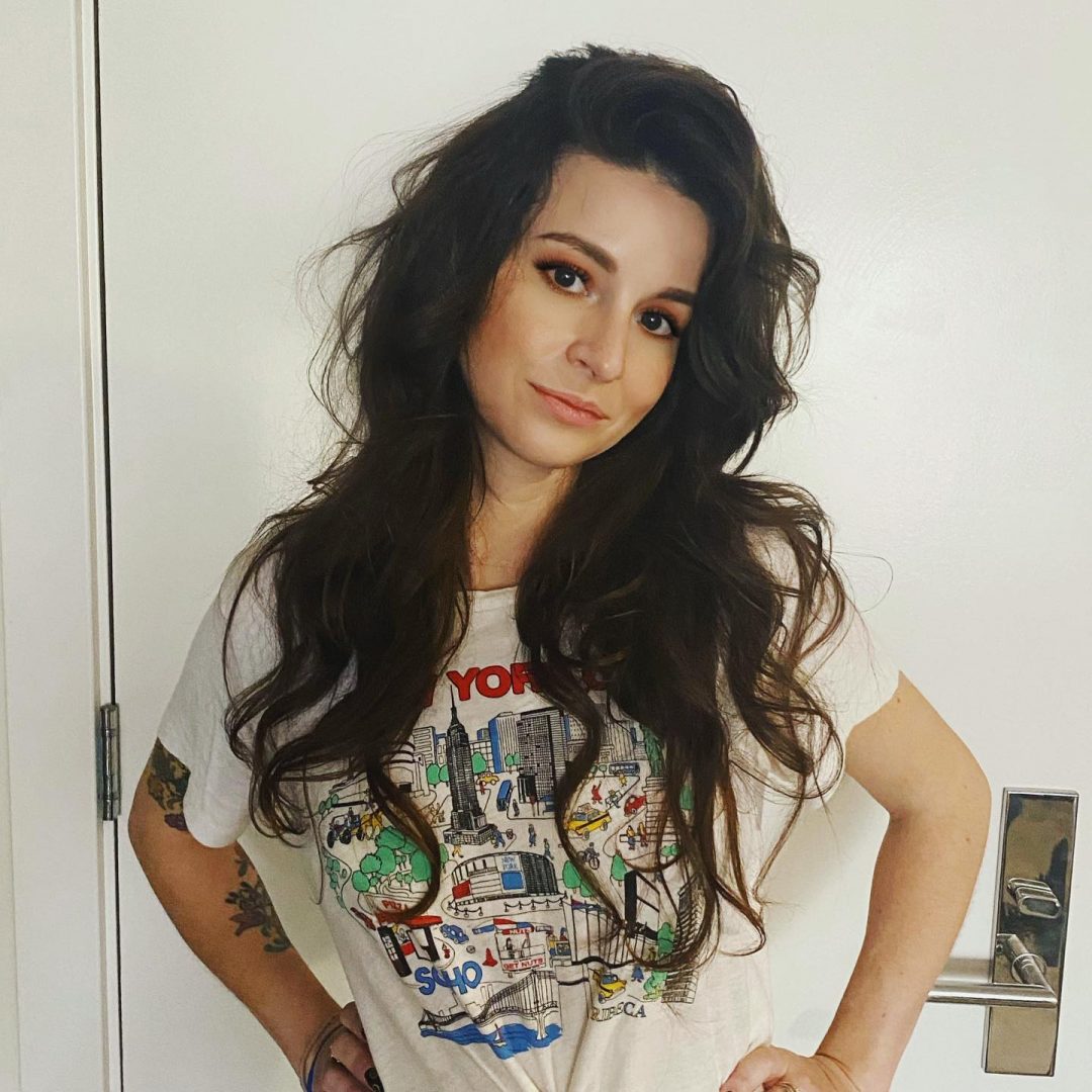 Face-Framing Layers With Side Part Are The Secret To Mega Volume