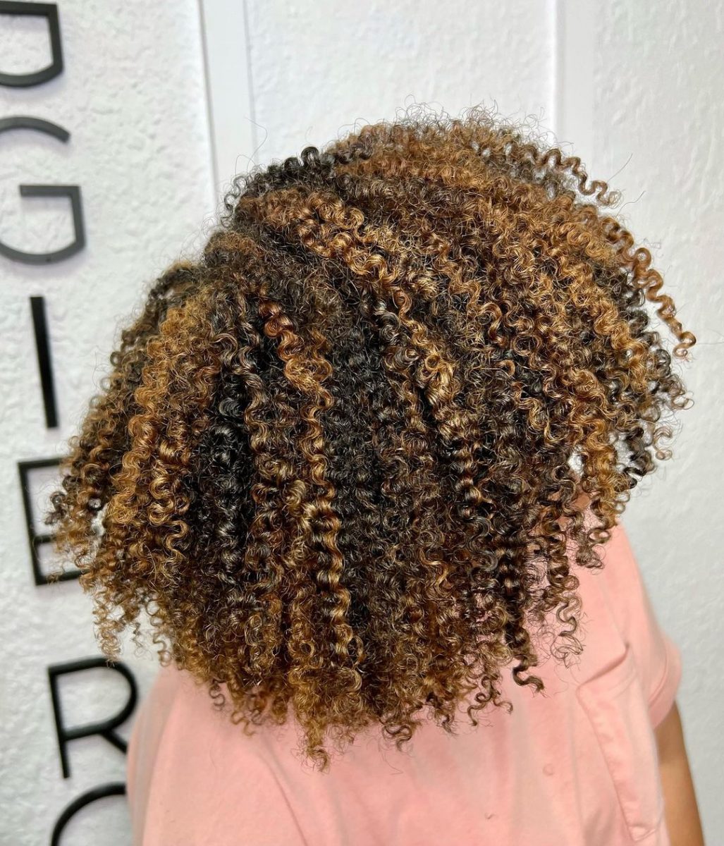 Curly Hair With Caramel Highlights Is 2025's Most Wanted Style