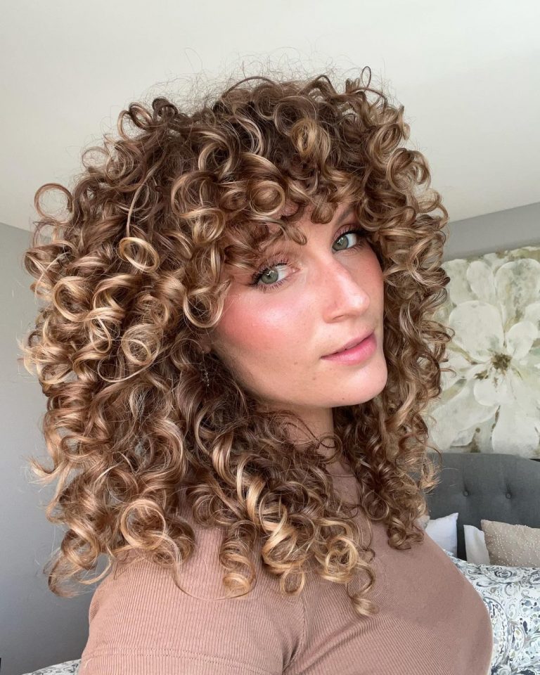 Curly Hair With Caramel Highlights Is 2025's Most Wanted Style