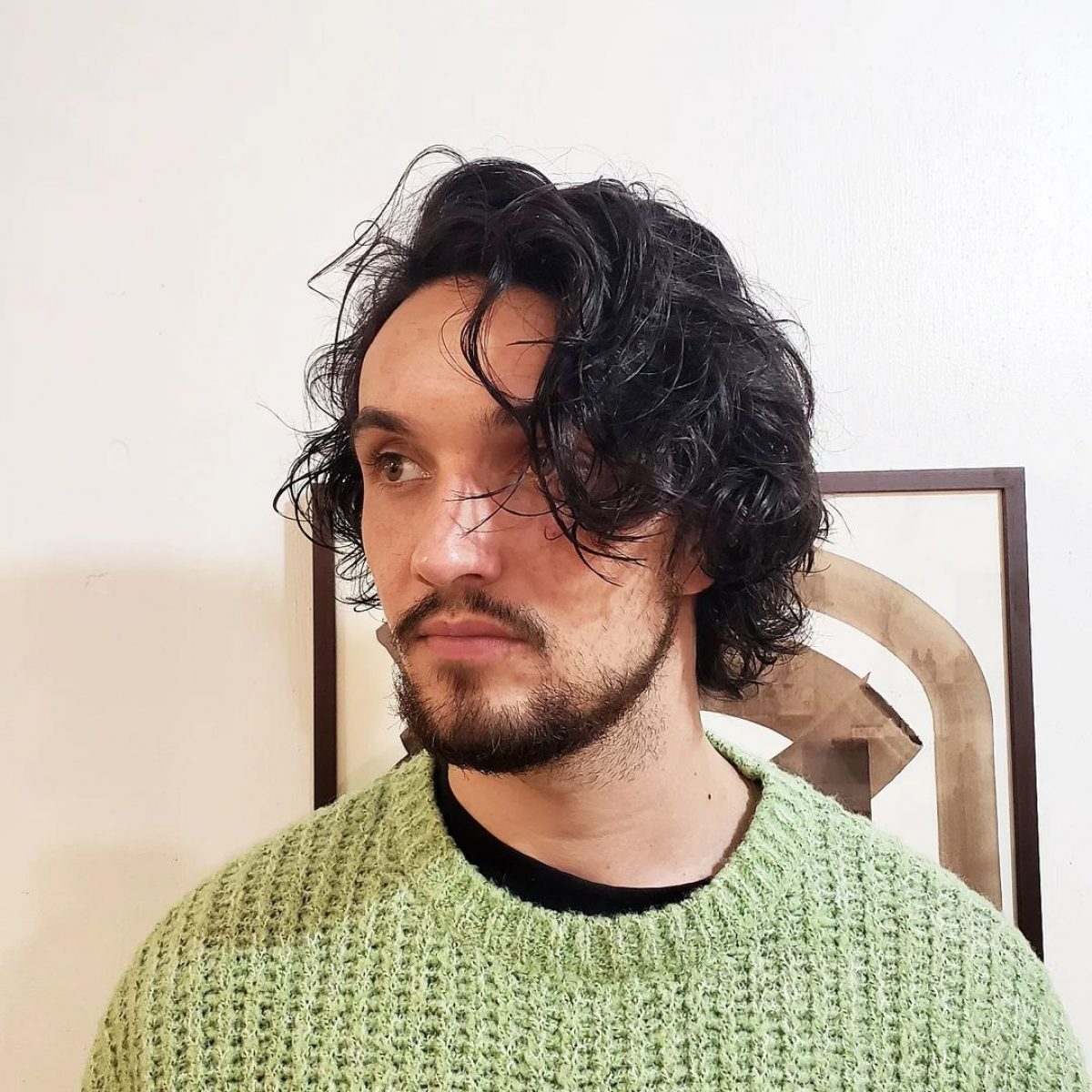 Los 17 cortes de pelo más elegantes para hombres con el pelo rizado