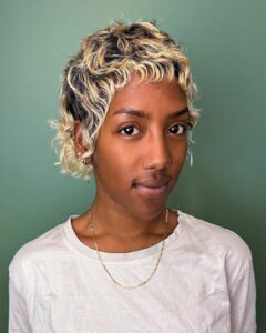 10 Curly Hair Mullet Ideas For An Iconic, Unconventional Look