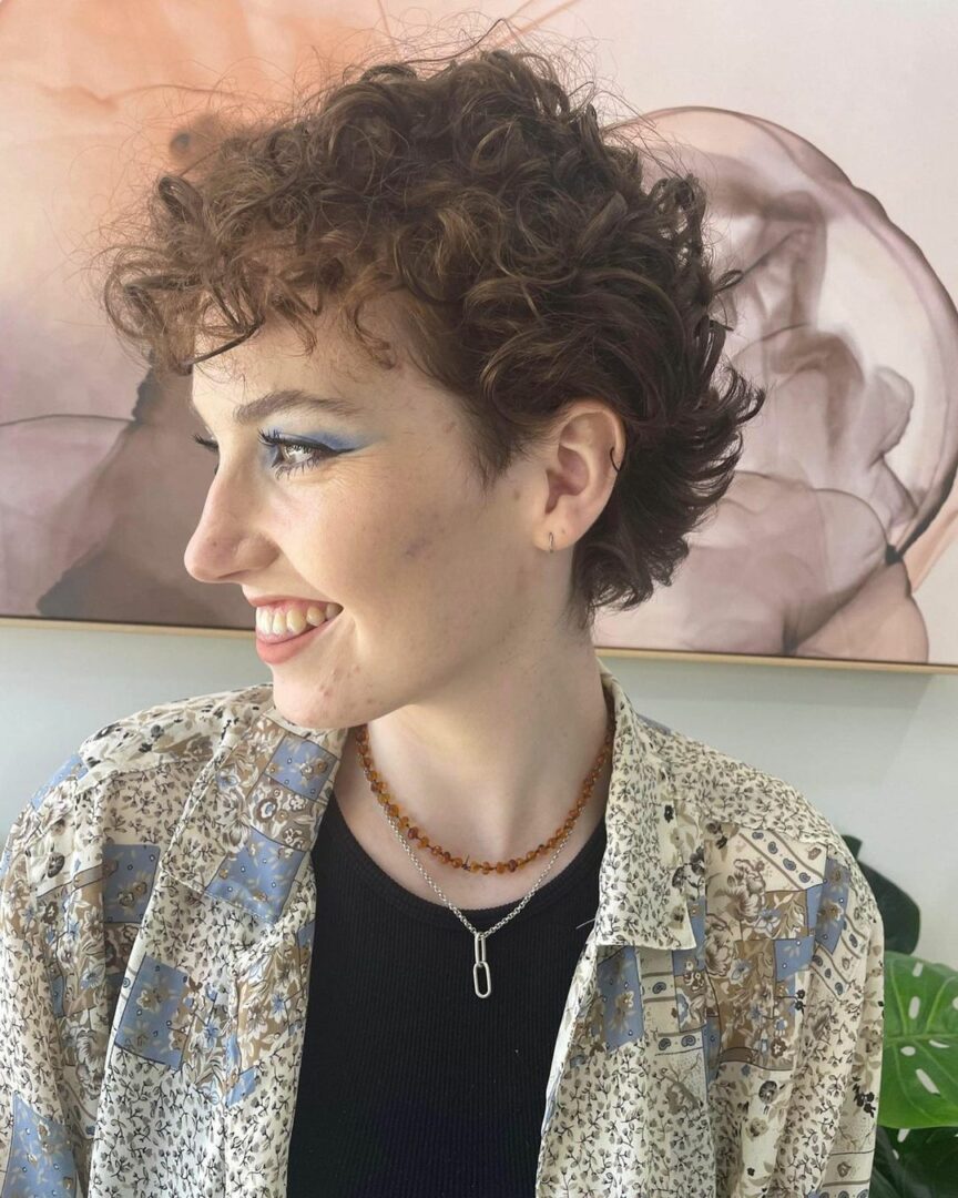 10 Curly Hair Mullet Ideas For An Iconic, Unconventional Look