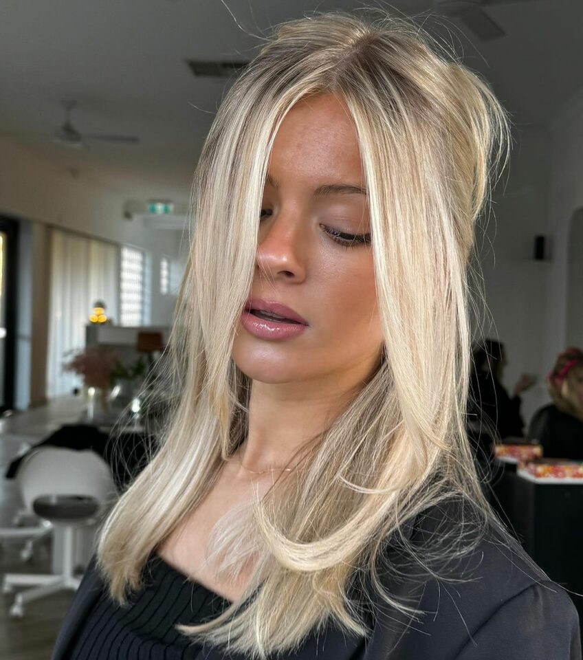 16 Winter Hairstyles That Are Both Cozy & Seriously Stylish