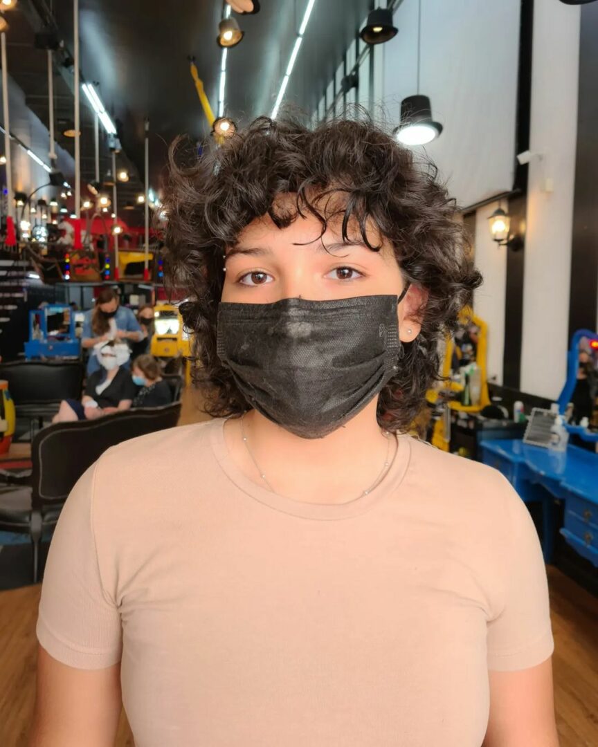 10 Curly Hair Mullet Ideas For An Iconic, Unconventional Look