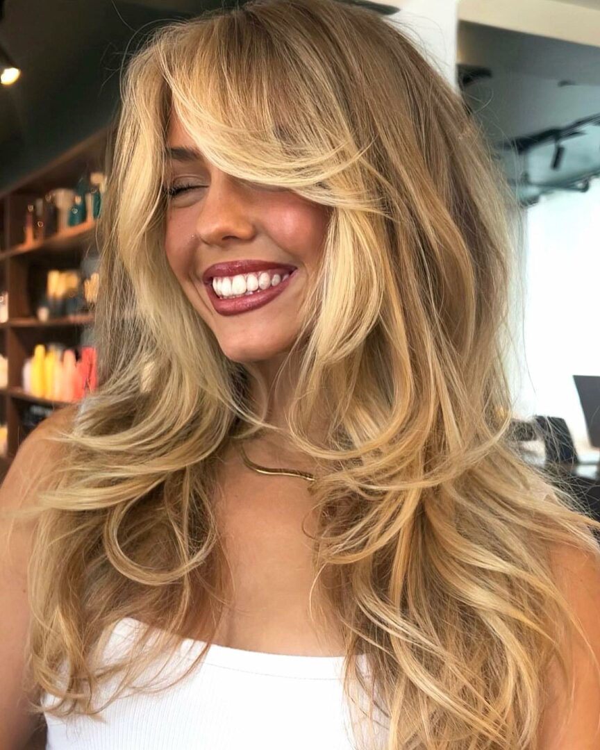 10 Gorgeous Ways To Wear Layered Hair With Curtain Bangs