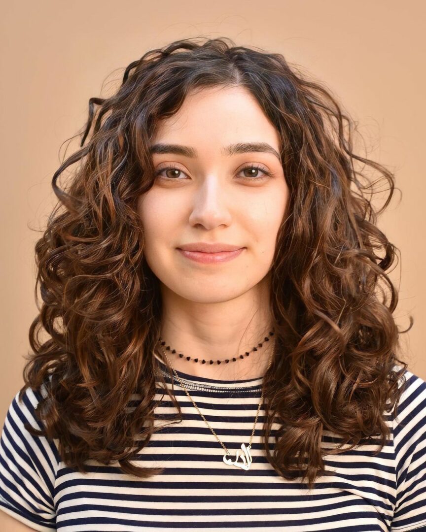 12 Layered Haircuts For Curly Hair That Will Transform Your Curls