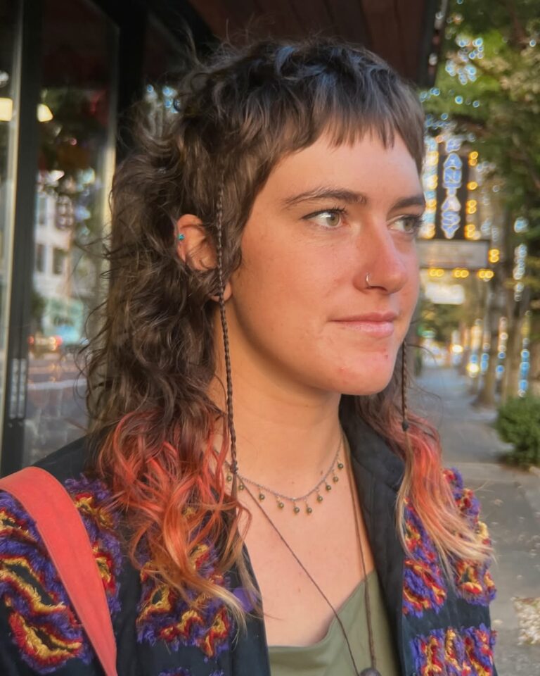 10 Curly Hair Mullet Ideas For An Iconic, Unconventional Look