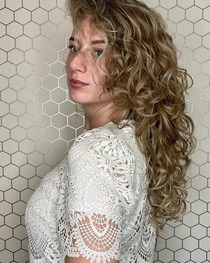 12 Layered Haircuts For Curly Hair That Will Transform Your Curls