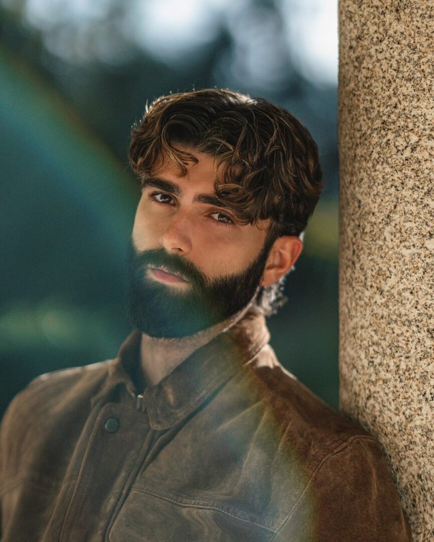 10 Middle Part Hairstyles For Men To Unlock The Boyish Charm