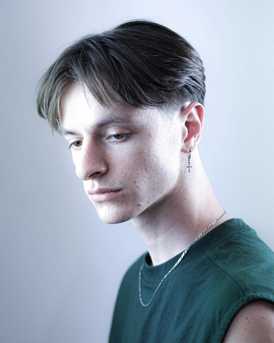 10 Middle Part Hairstyles For Men To Unlock The Boyish Charm