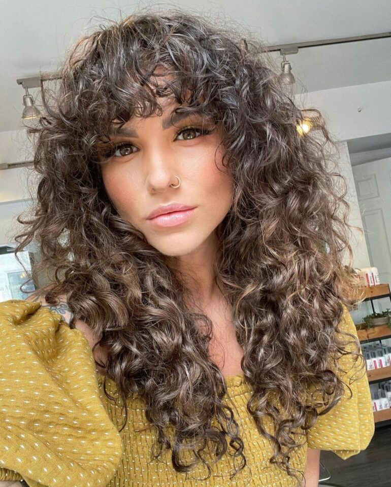 12 Trending Hairstyles With Curly Bangs To Try ASAP