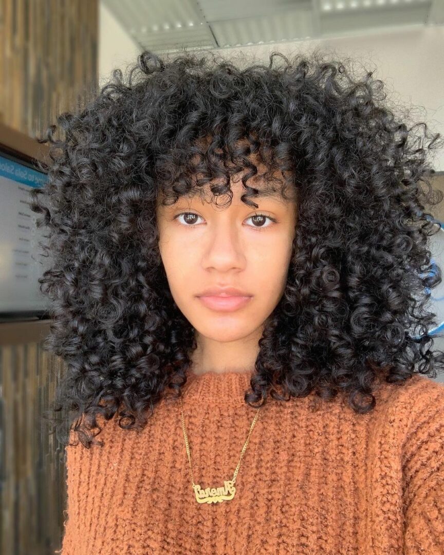 12 Trending Hairstyles With Curly Bangs To Try ASAP