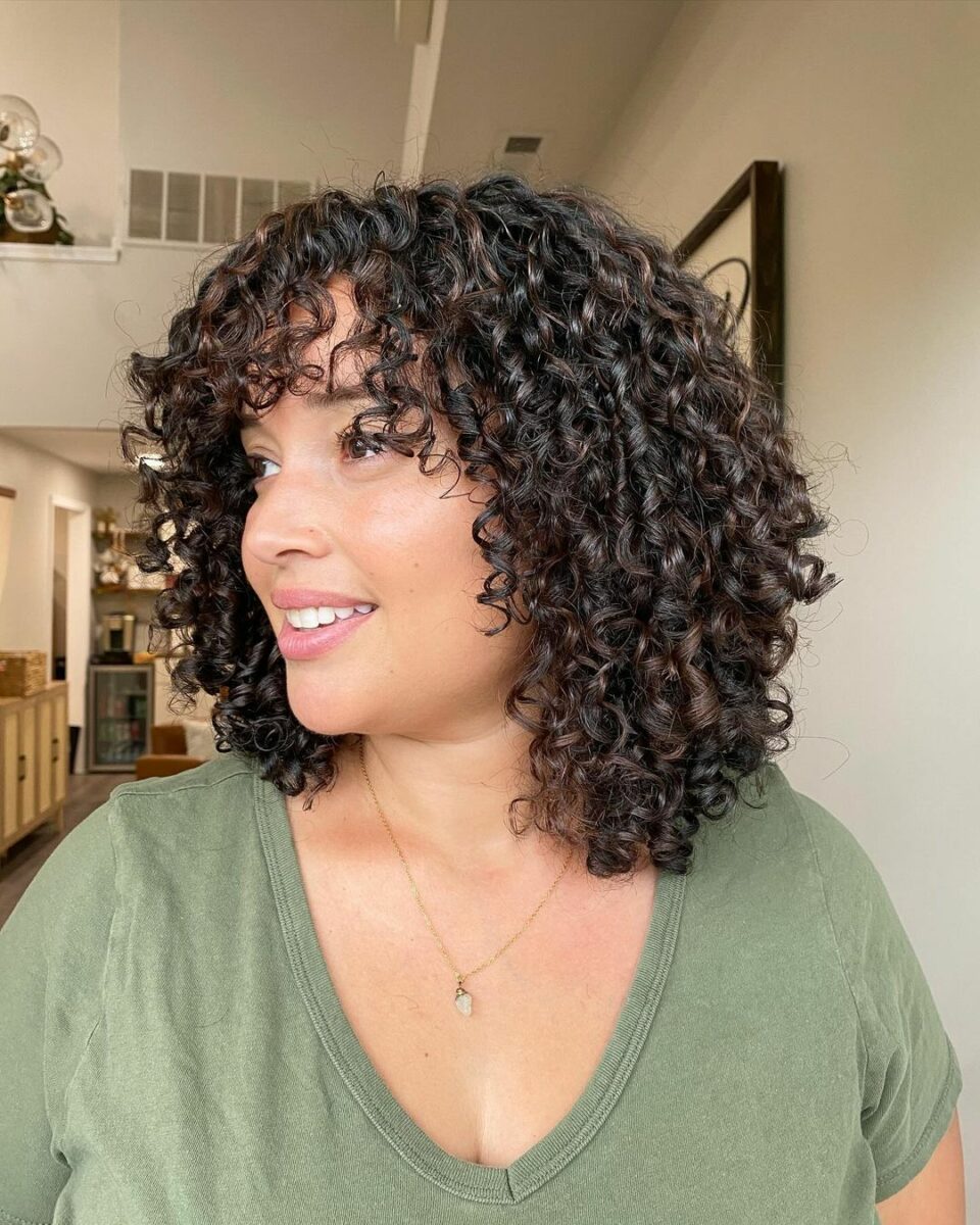 12 Trending Hairstyles With Curly Bangs To Try ASAP