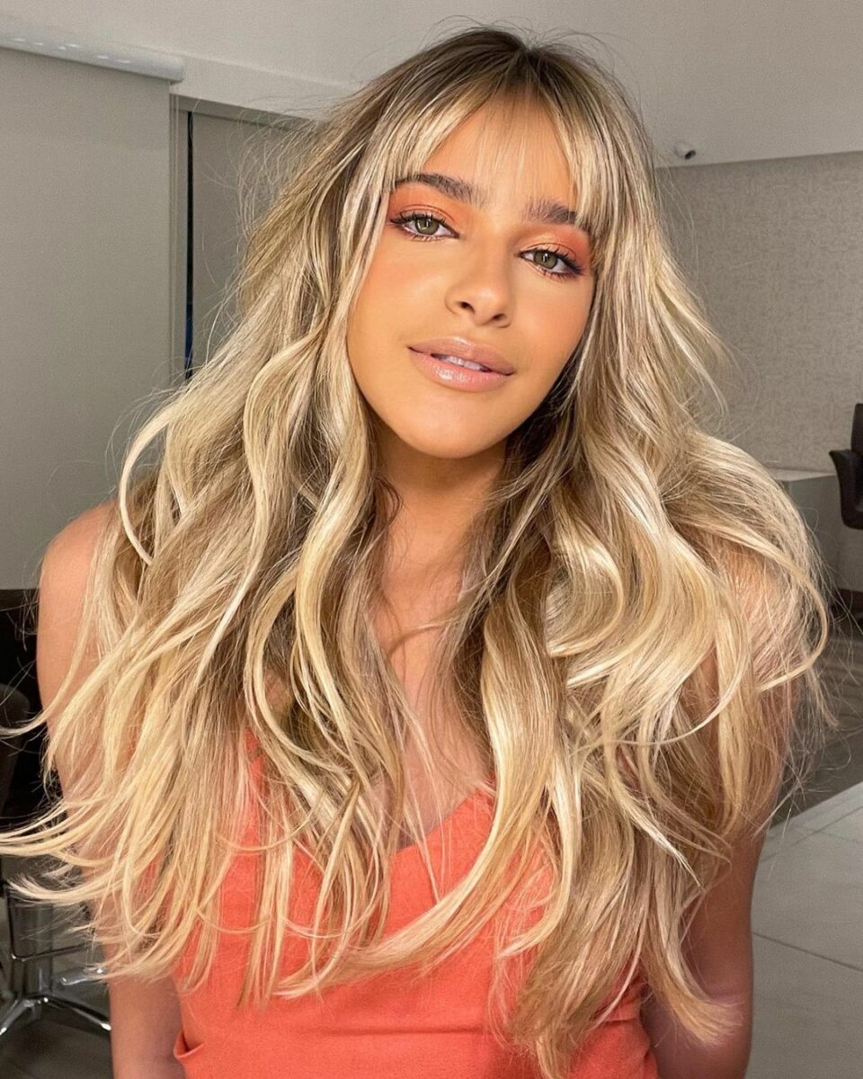 10 Pretty And Easy Ways To Wear Wispy Bangs On Long Hair