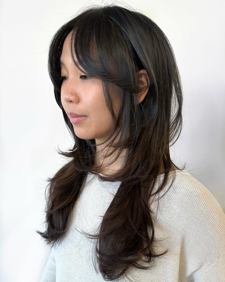 12 Fun And Fabulous Ways To Blend Curtain Bangs Into A Choppy Wolf Cut