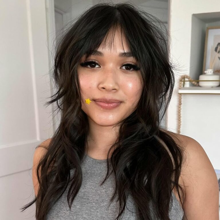 12 Fun And Fabulous Ways To Blend Curtain Bangs Into A Choppy Wolf Cut