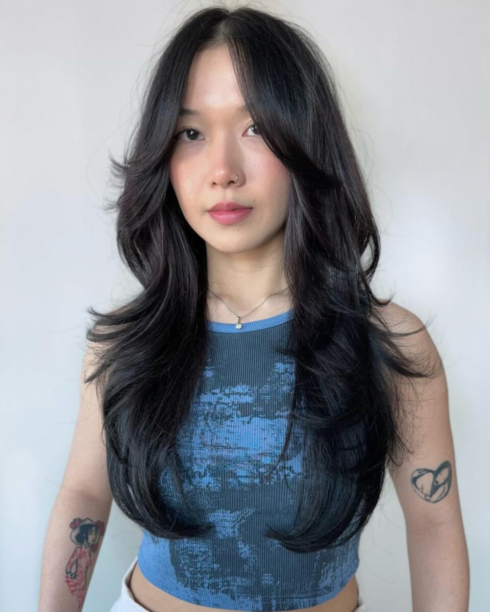 12 Fun And Fabulous Ways To Blend Curtain Bangs Into A Choppy Wolf Cut