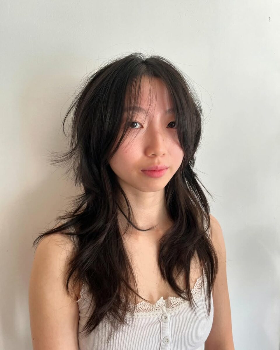 12 Fun And Fabulous Ways To Blend Curtain Bangs Into A Choppy Wolf Cut