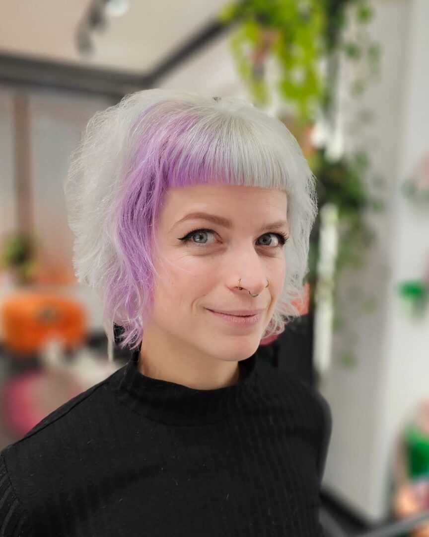 11 Chin-Length Haircuts With Bangs For A Chic And Flattering Look