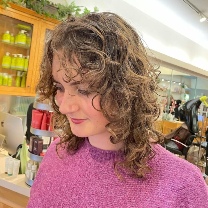 10 Curly Shaggy Lob Haircuts Packed With Texture And Personality