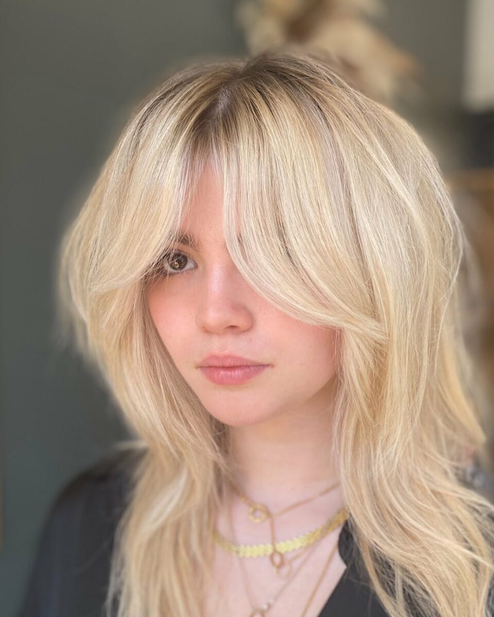 12 Fun And Fabulous Ways To Blend Curtain Bangs Into A Choppy Wolf Cut