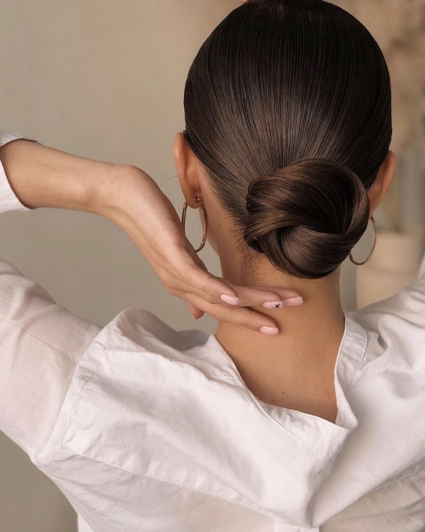 11 Trendy Slick Back Bun Styles For Every Occasion