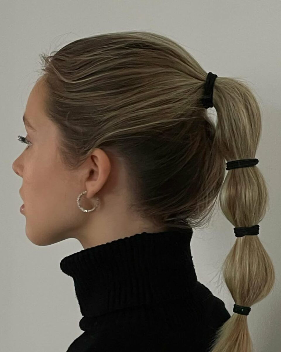 10 Effortlessly Elegant Middle Part Ponytail Hairstyles You'll Love